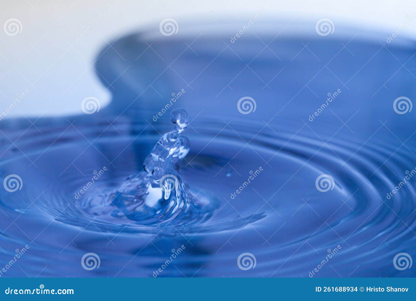 Water Drop Splash with Ripples on Water Surface Stock Photo - Image of ...