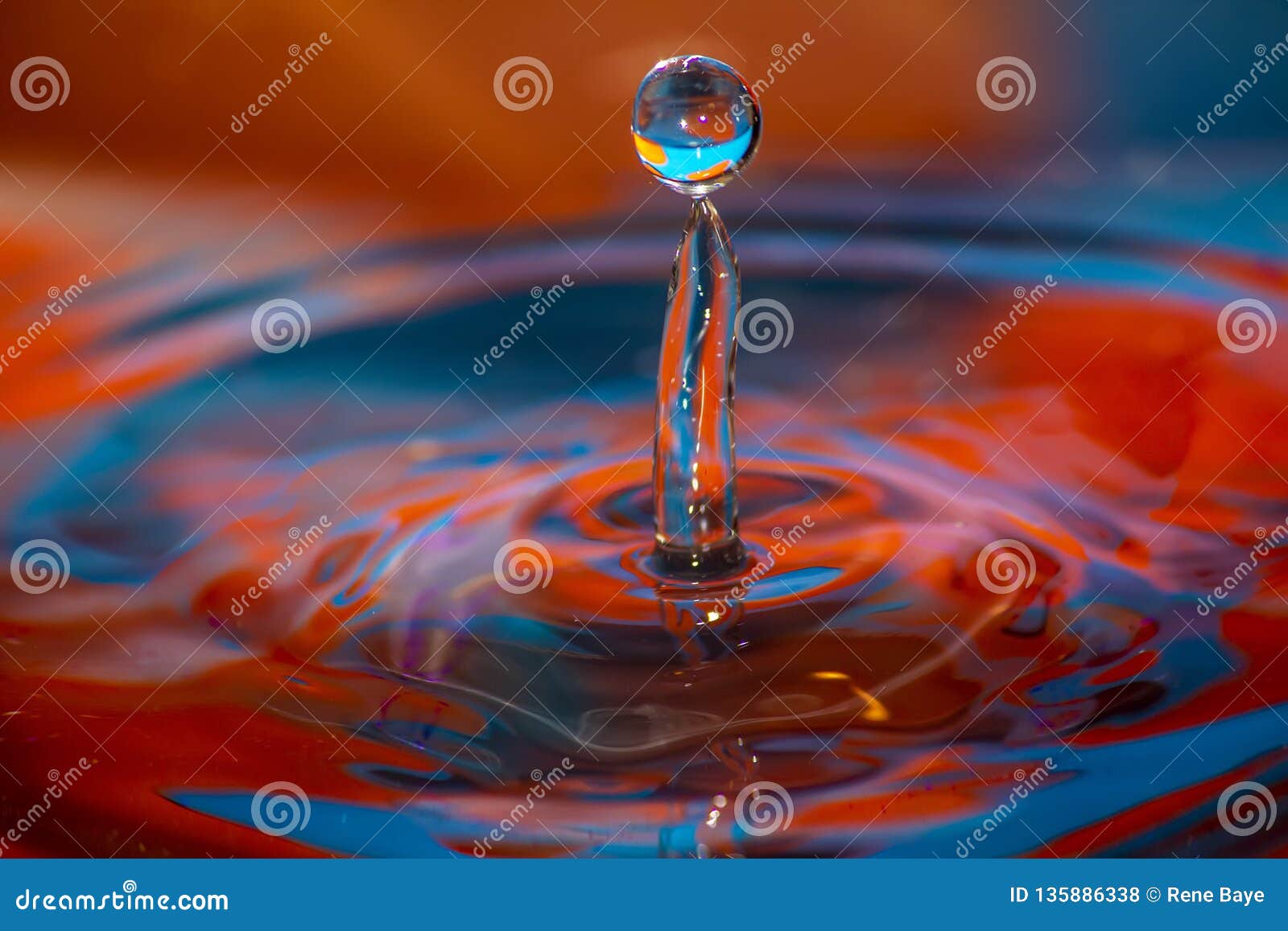 Water drop and ripples stock photo. Image of ripples - 135886338