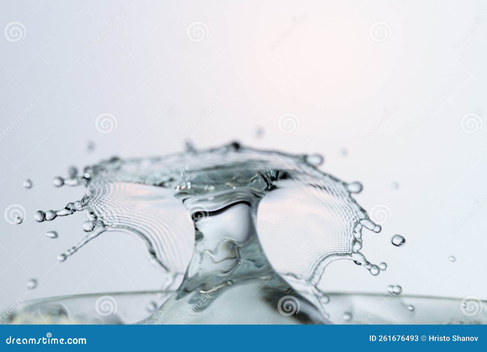 Water Drop Splash with Ripples on Water Surface Stock Image - Image of ...