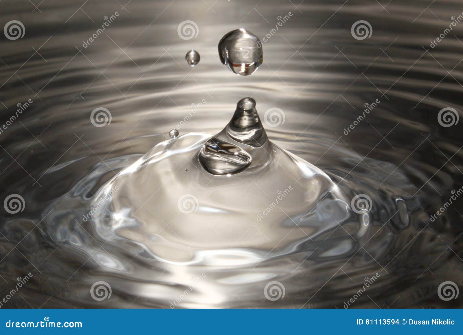Water Drop Splashes in the Water Stock Photo - Image of background ...