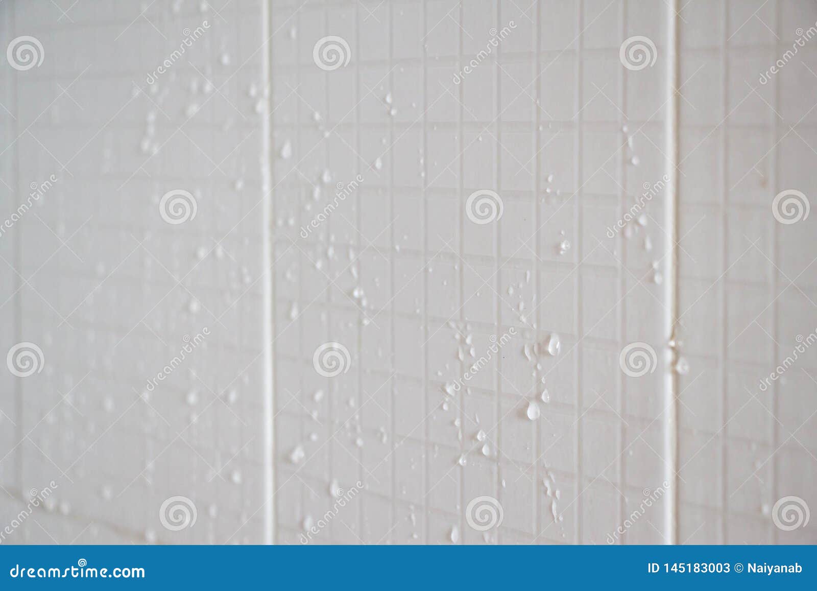 Water drop on tile wall stock image. Image of clear - 145183003