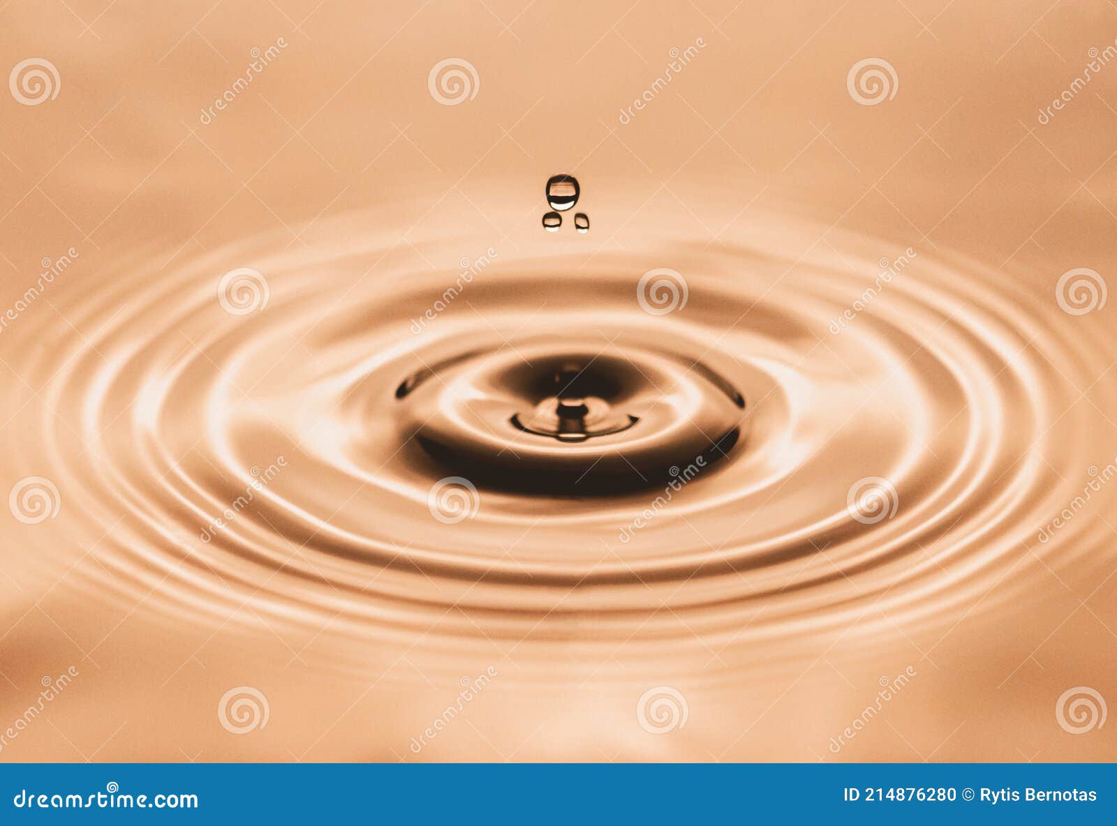 Water Droplet Dripping into Pool Creating Ripples Stock Photo - Image ...