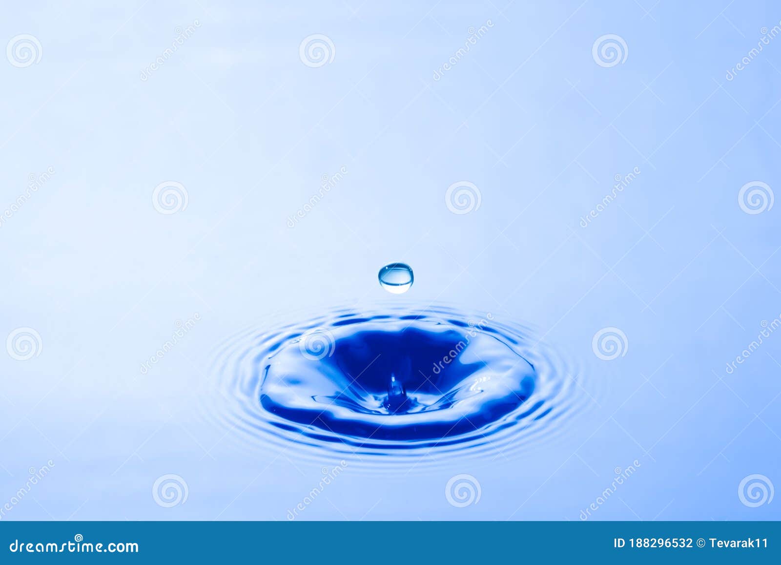 Water Droplet Falling Impact with Water Surface. Causing Rings on Water ...