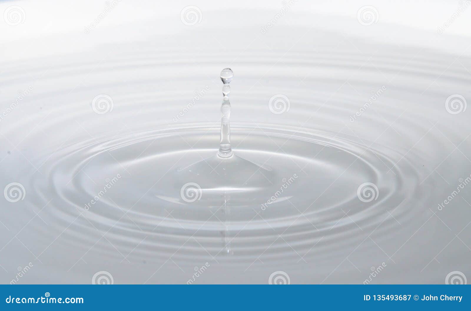 Water droplet splash 1 stock image. Image of exposure - 135493687