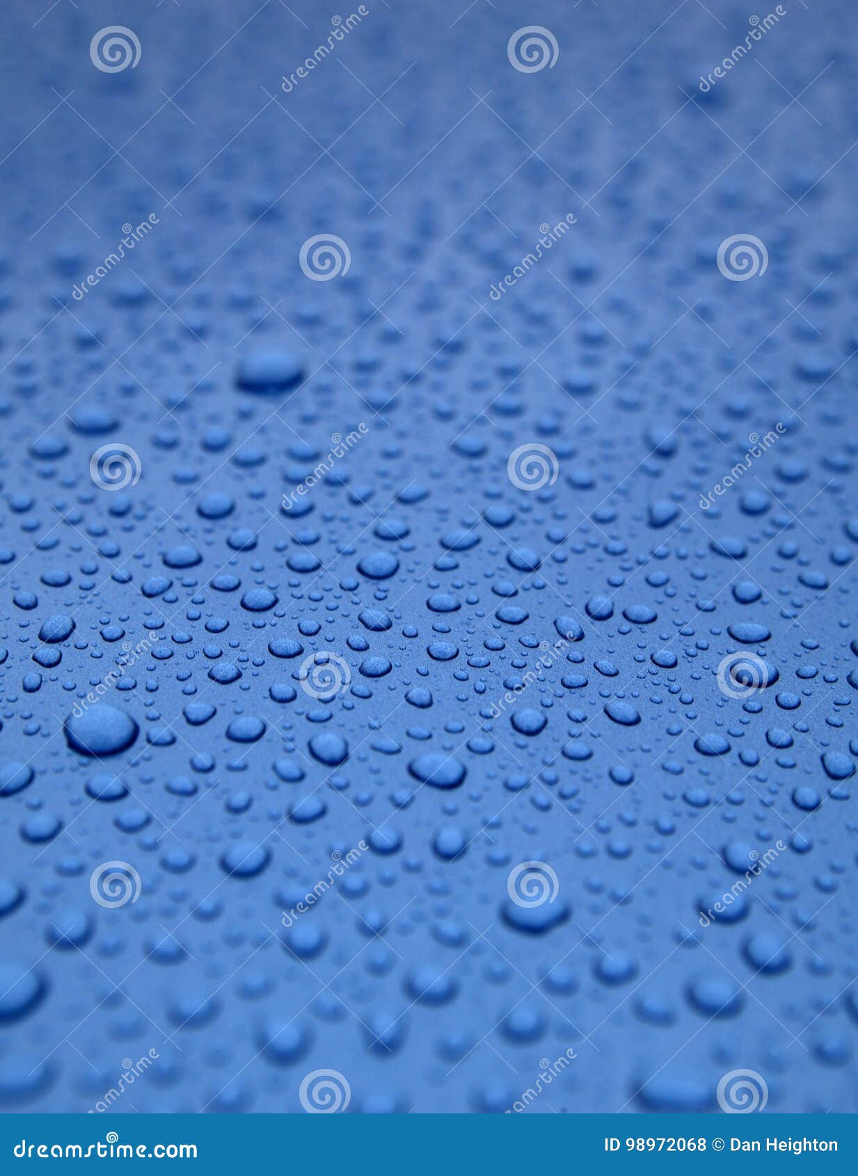 WATER DROPLETS on BLUE METALLIC SURFACE Stock Photo - Image of ...