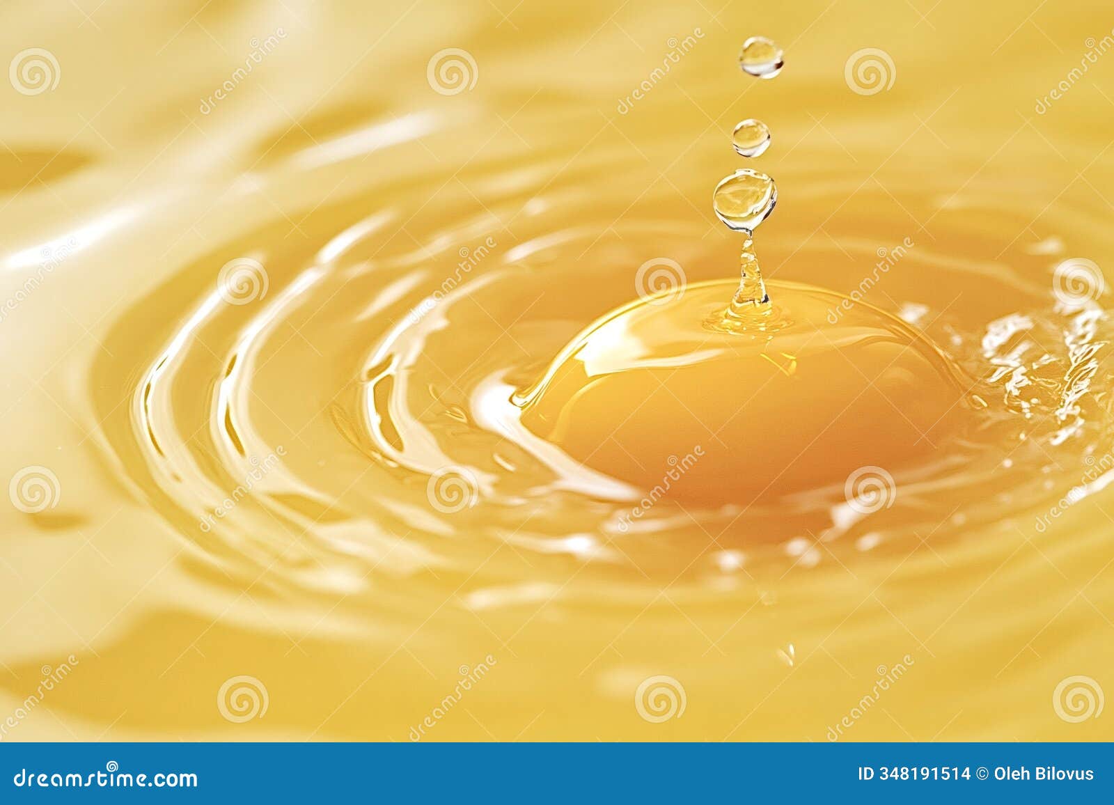 Mesmerizing Concentric Ripples Spreading Across A Golden Water Surface ...