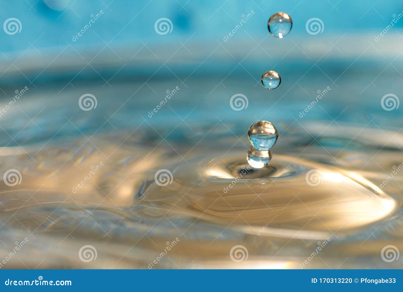 Water Droplets Falling Down and Forming Abstract Shapes Stock Photo ...