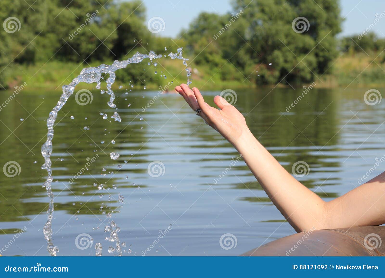 Water dropping from a hand stock photo. Image of concepts - 88121092