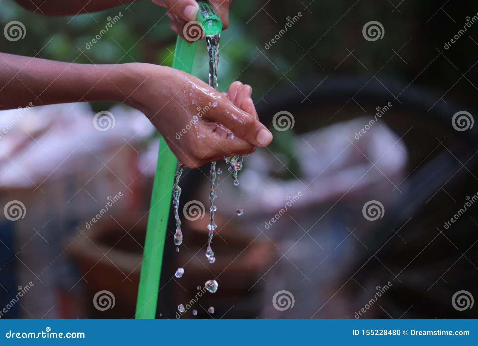 Water Dropping from Orange Pipe Stock Photo - Image of deluge, dropping ...