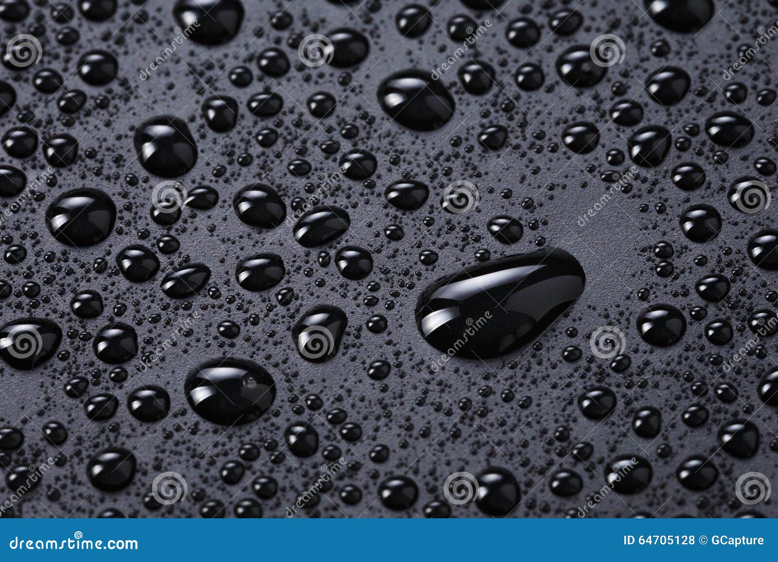 Water Drops on a Black Plastic Surface Stock Photo - Image of abstract ...