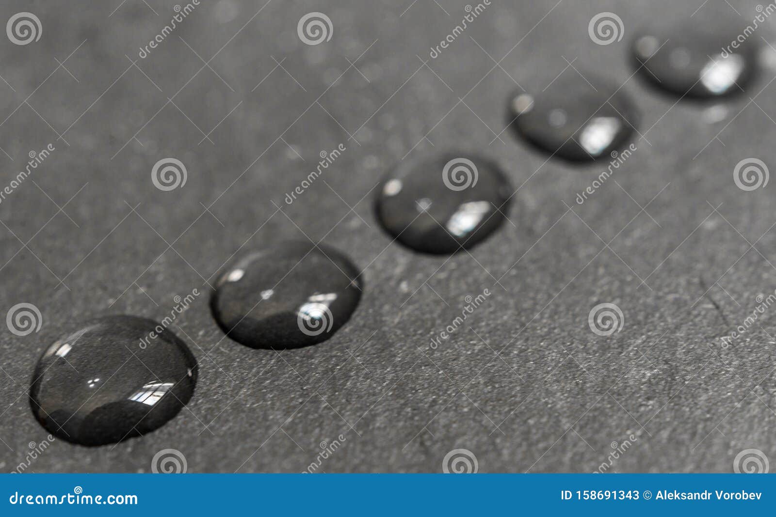 Water Drops on a Black Slate Background. Stock Image - Image of macro ...