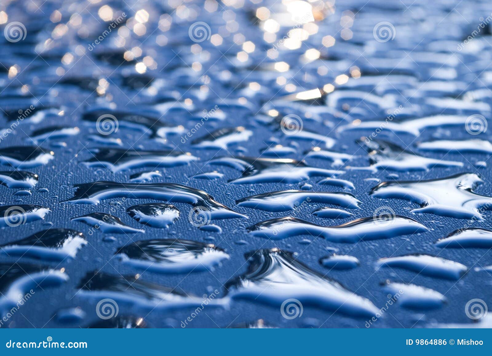 Water drops on blue stock photo. Image of abstract, pattern - 9864886