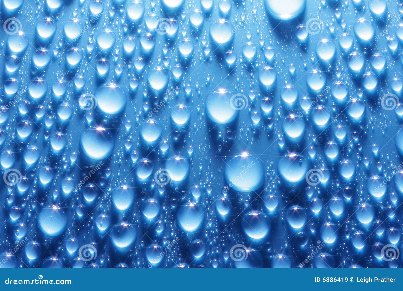 Water drops blue surface stock image. Image of droplets - 6886419