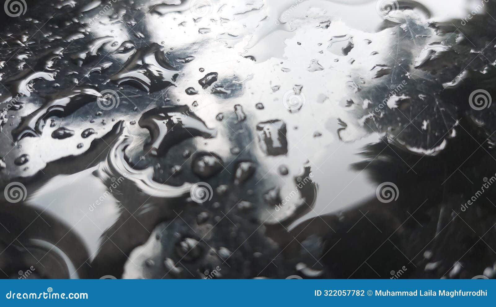 Water Drops Blur Abstract Background on Black Ceramic Tile Stock Photo ...