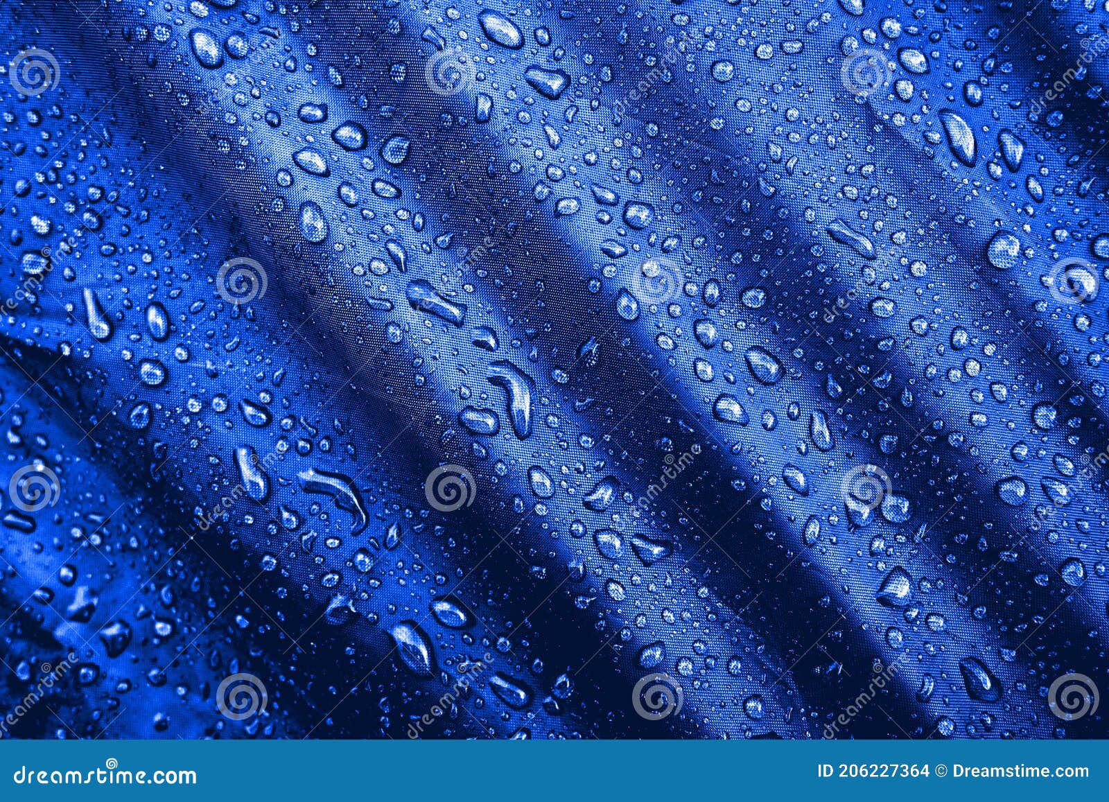 Water drops on the fabric. stock photo. Image of umbrella - 206227364