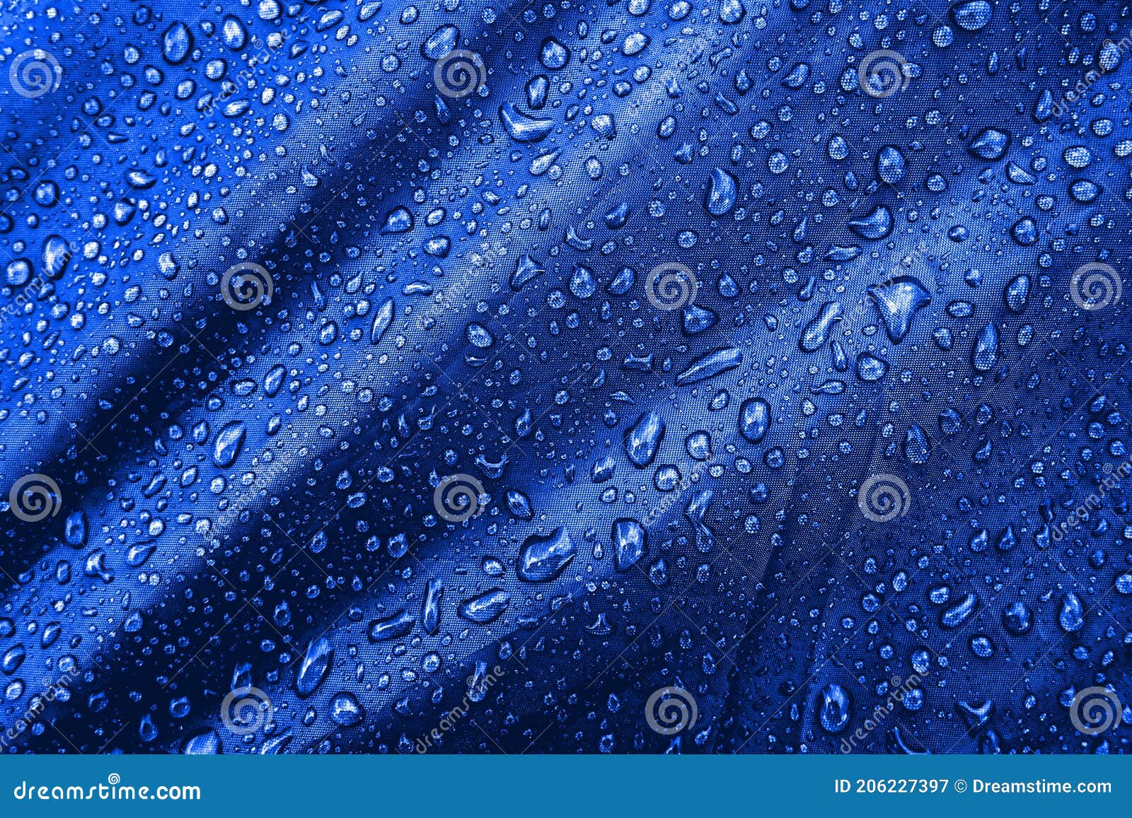 Water drops on the fabric. stock image. Image of pattern - 206227397
