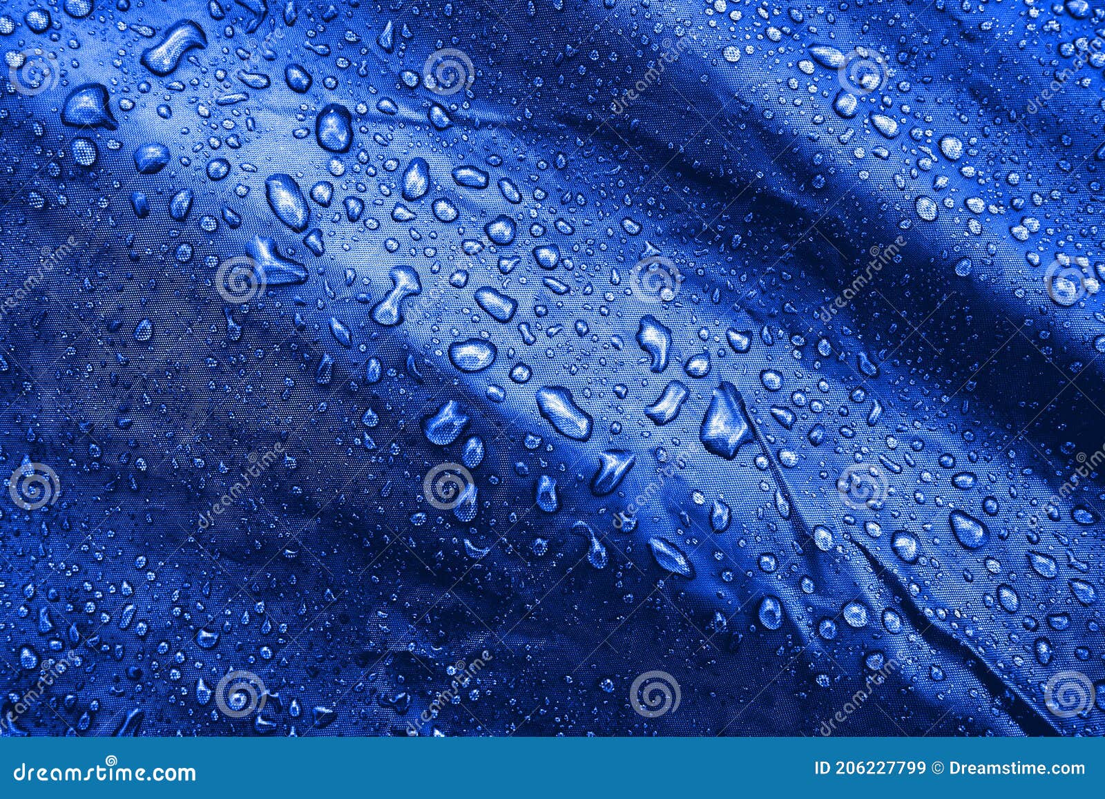 Water drops on the fabric. stock image. Image of macro - 206227799