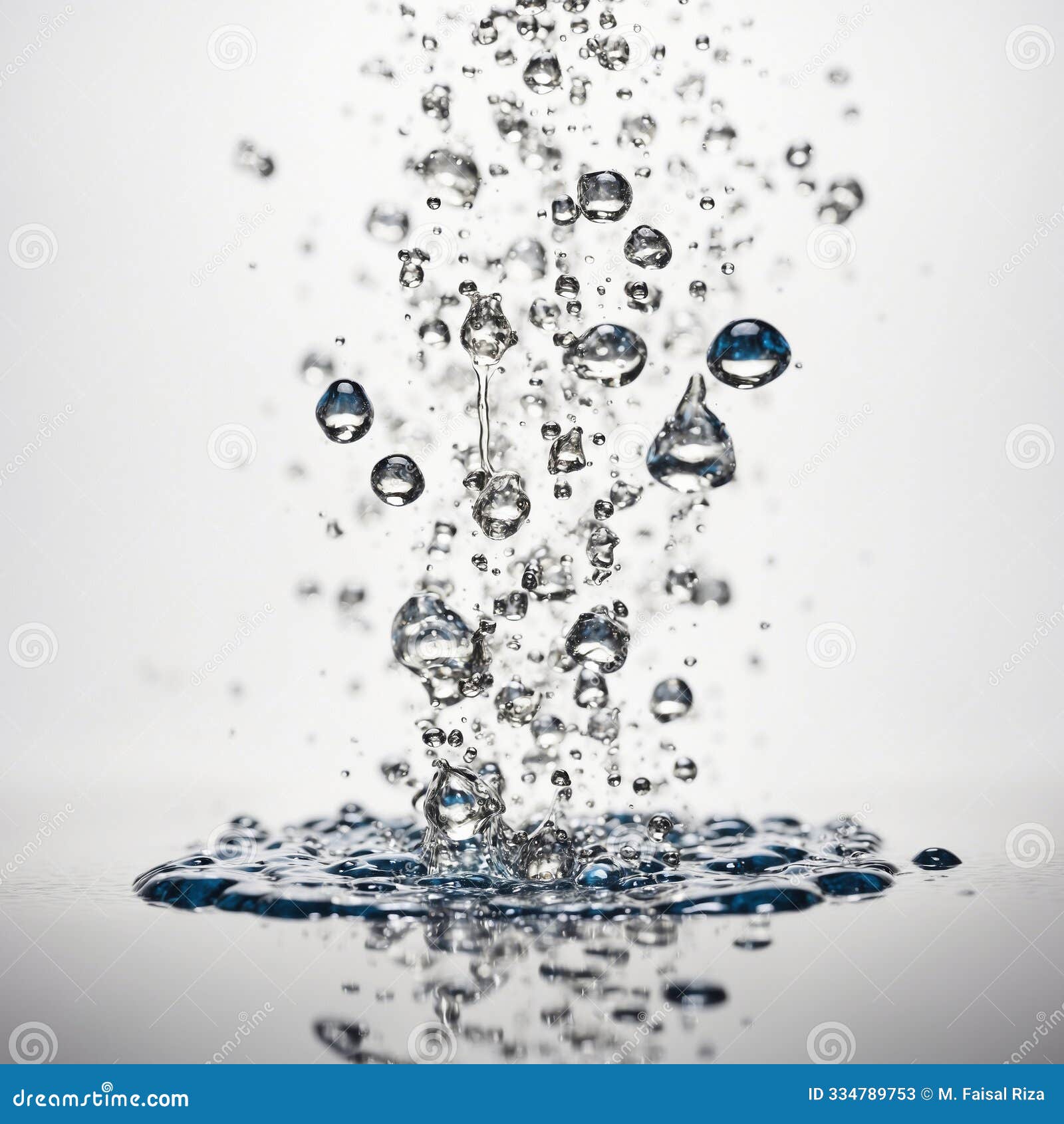 Water Drops Falling into a Puddle Isolated on a White Background Stock ...