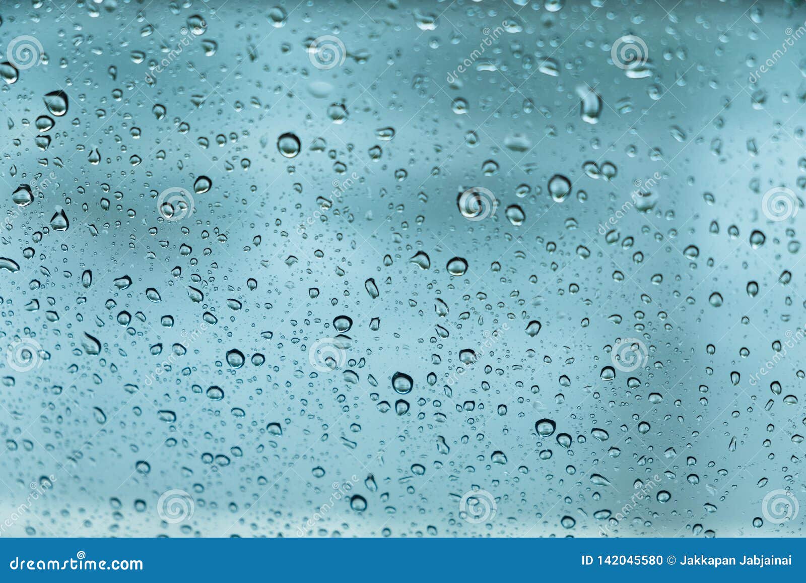 Water Drops on Glass in Spring. Stock Photo - Image of droplet, liquid ...