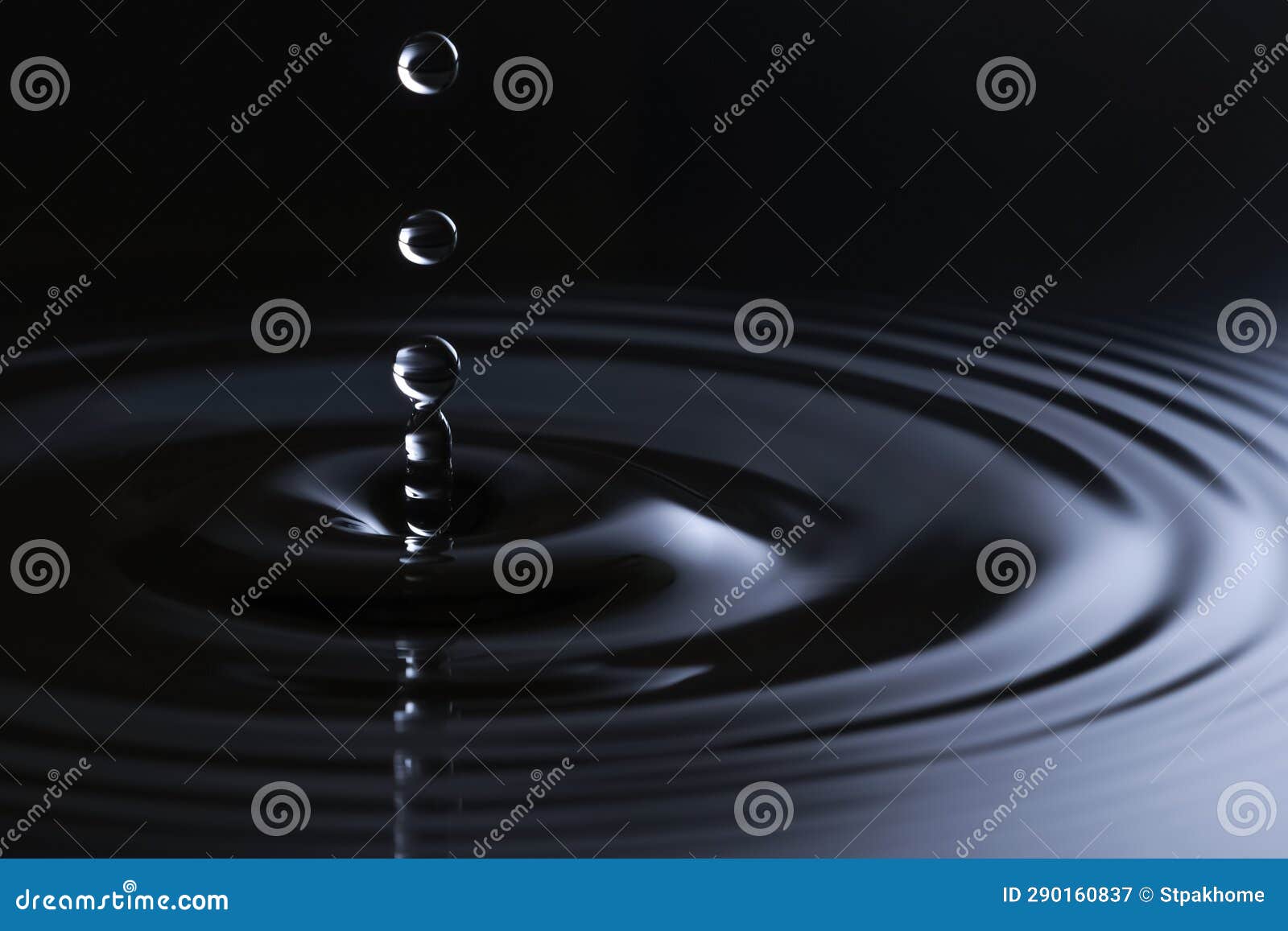 Water Drops Hitting the Clean Surface of the Water Close-up Stock Image ...