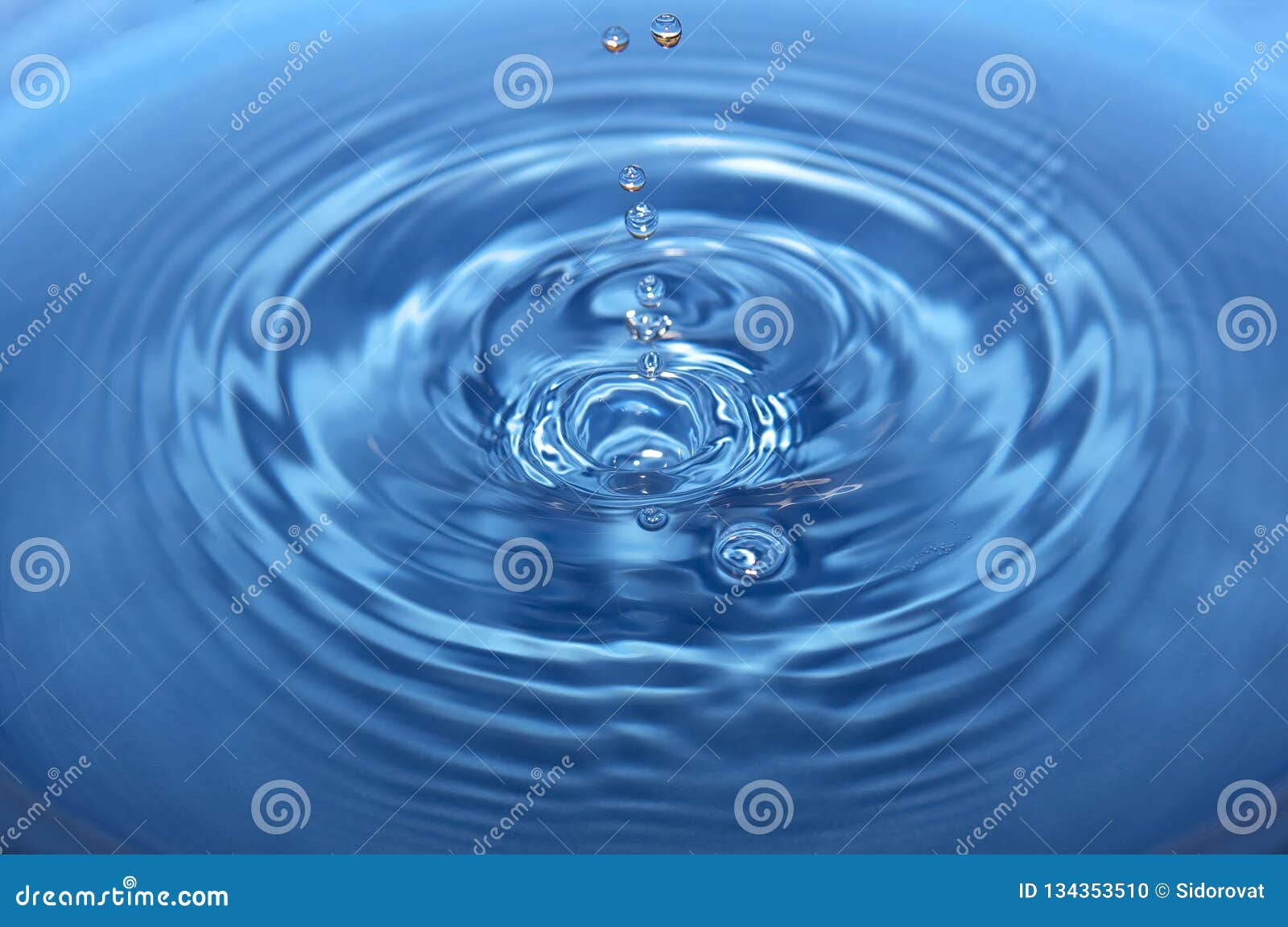 Water Drops Making a Splash with Ripples Stock Photo - Image of ripples ...