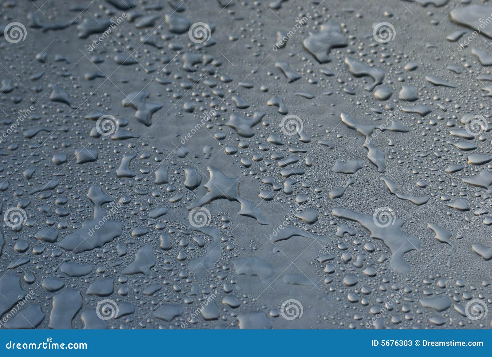 Water Drops On Metal Surface Stock Image - Image of light, drop: 5676303
