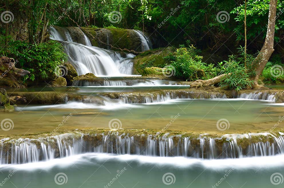 Water fall in deep forest stock photo. Image of motion - 58283978