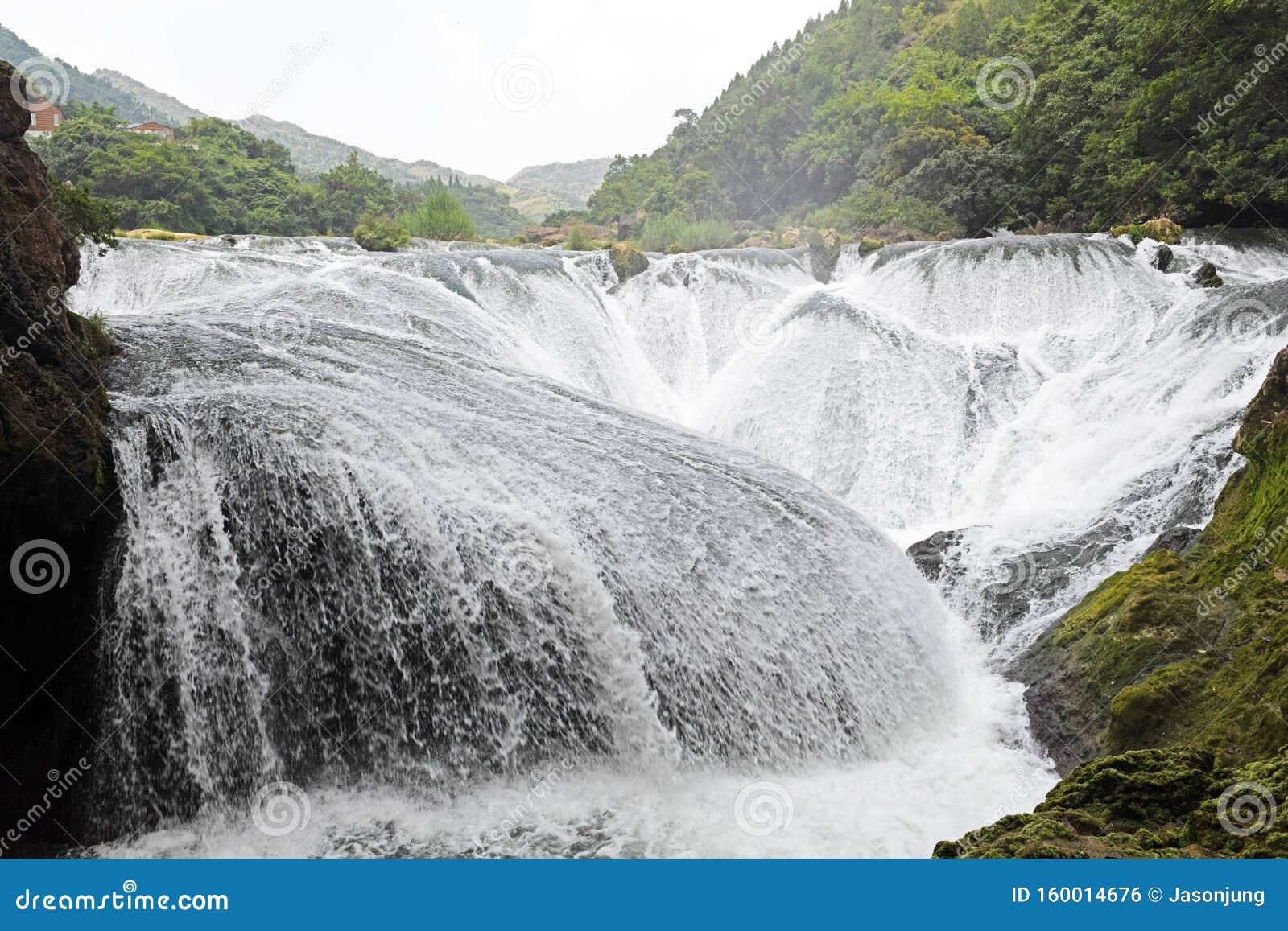 Waterfall in slow motion stock photo. Image of lake - 160014676