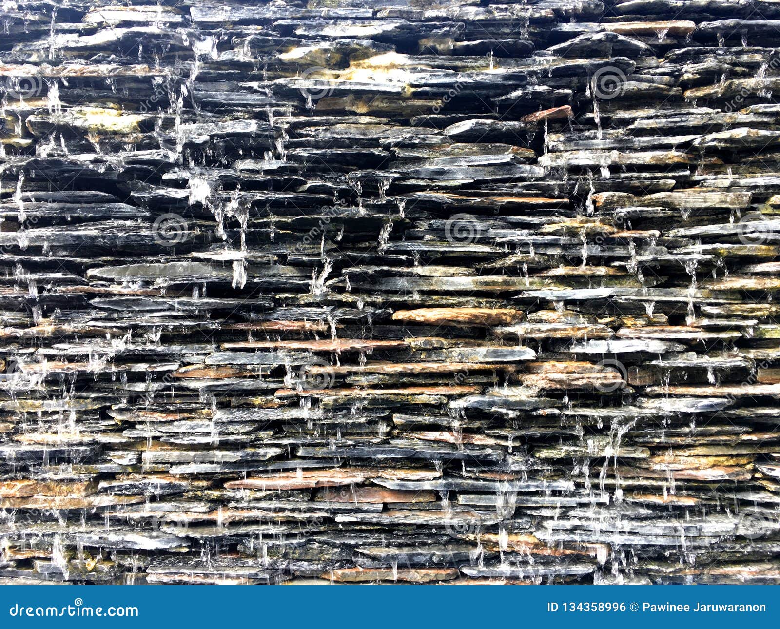 Water Fall and Splatter from Infinity Pool through Stone Tile Stock ...