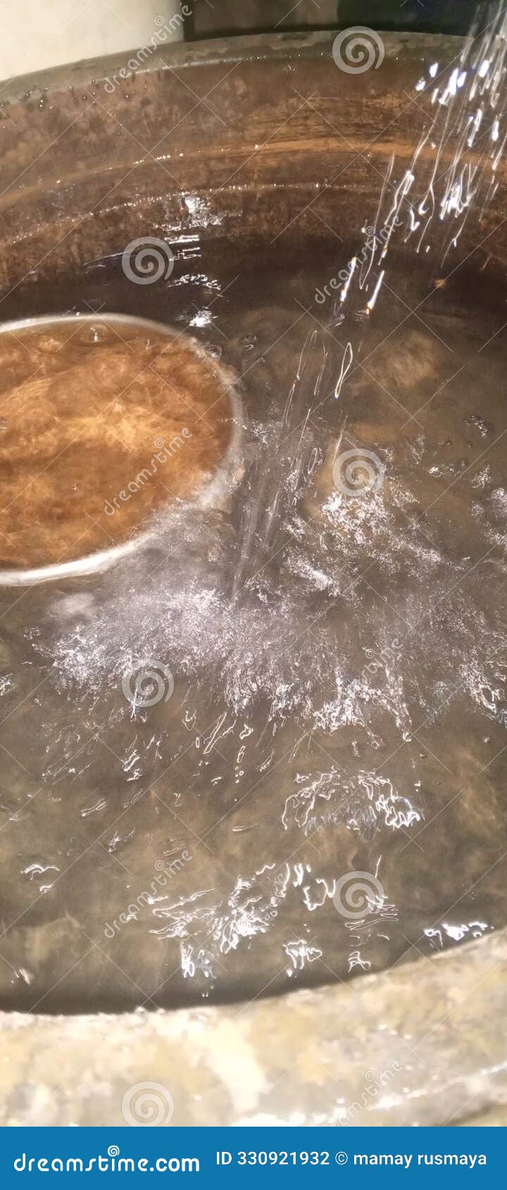 Water Falling into the Bucket Stock Photo - Image of bucket, water ...