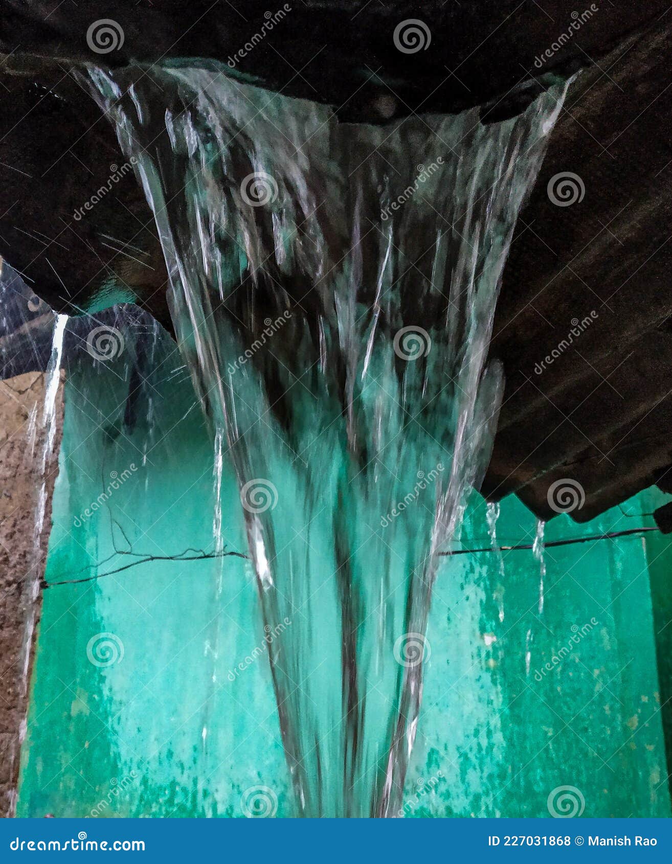 The water is falling down. stock photo. Image of glass - 227031868