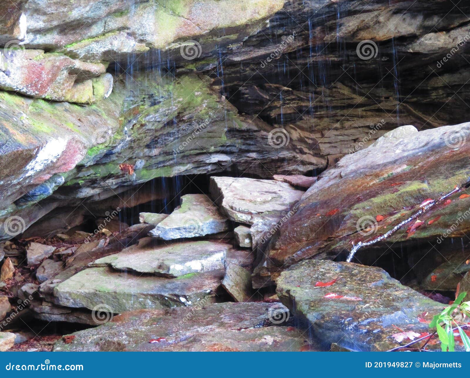 Water Falling in Front of Gray Angular Rock Cave Stock Image - Image of ...