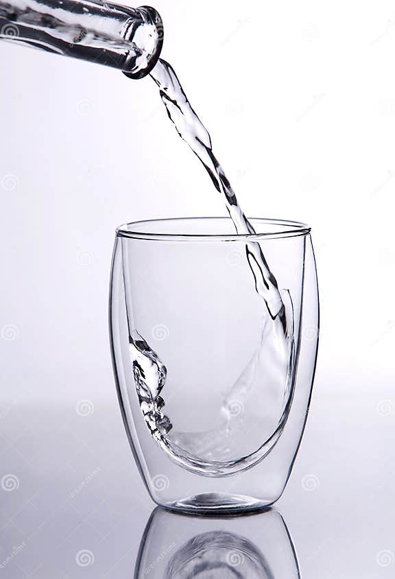 Water falling into glass stock image. Image of simple - 18246303