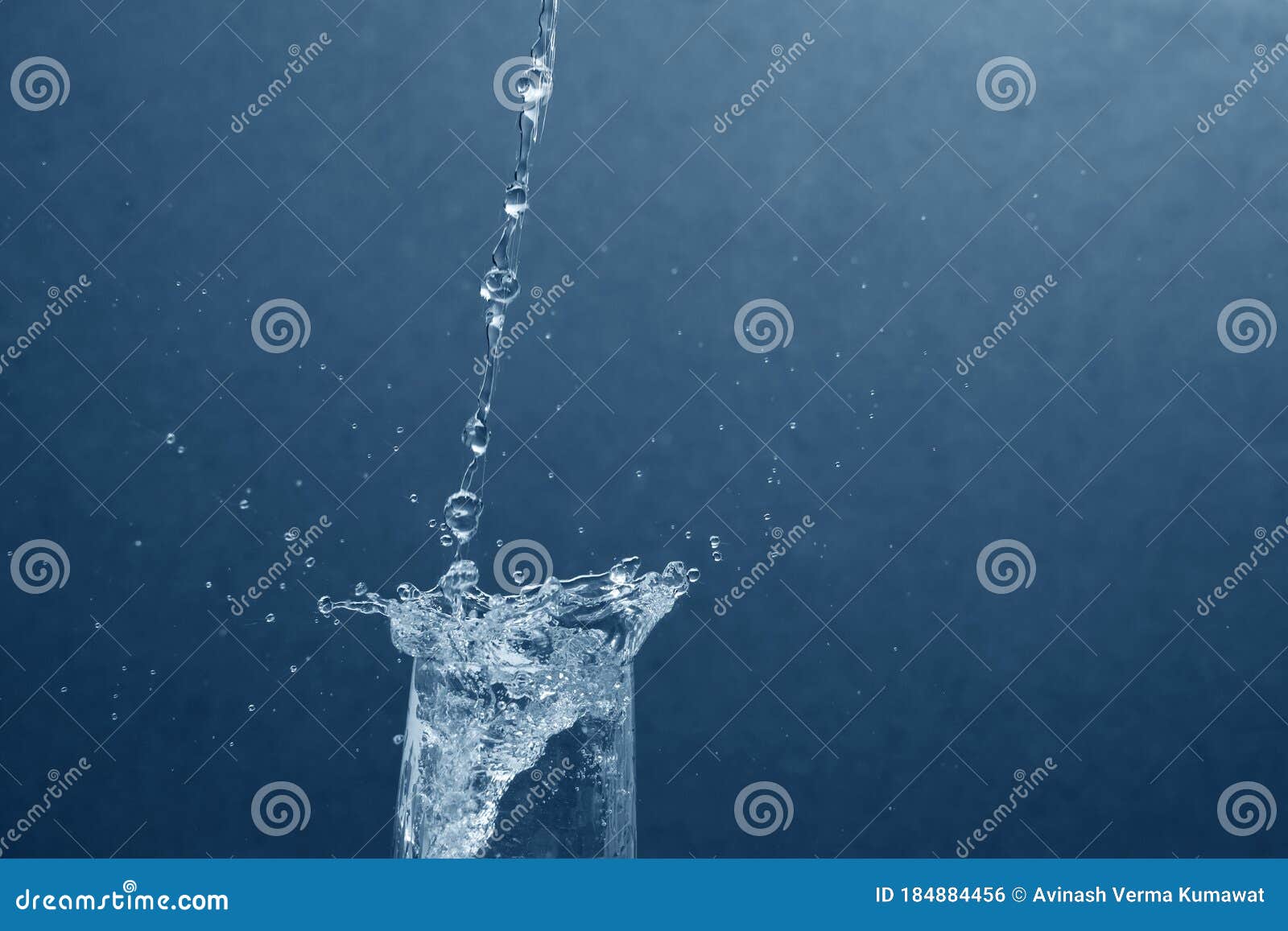 Water falling into a glass stock photo. Image of arctic - 184884456