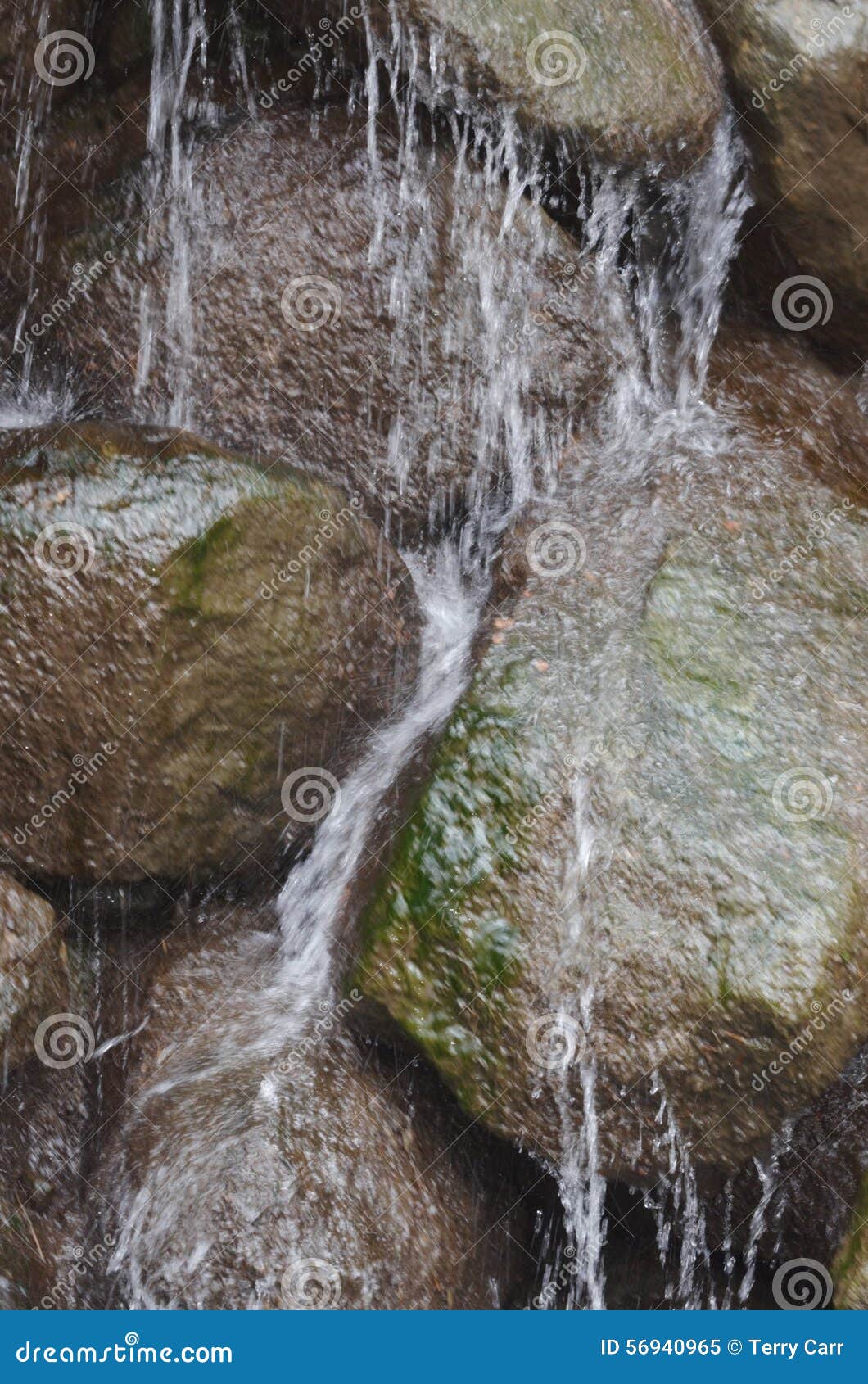Water falling over rocks stock image. Image of closeup - 56940965