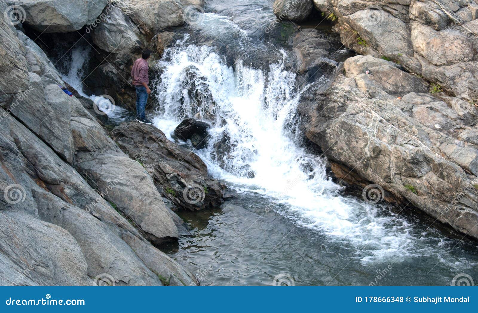 Water Falling between the Rocks and Mixing with a River Stock Photo ...