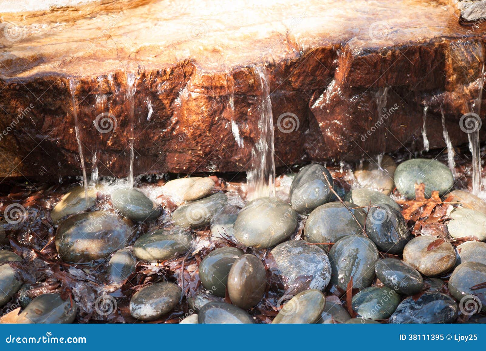 Water falling on rocks stock image. Image of falling - 38111395