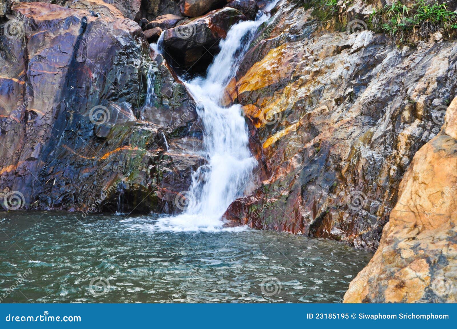 Water falling from a stone stock image. Image of peaceful - 23185195