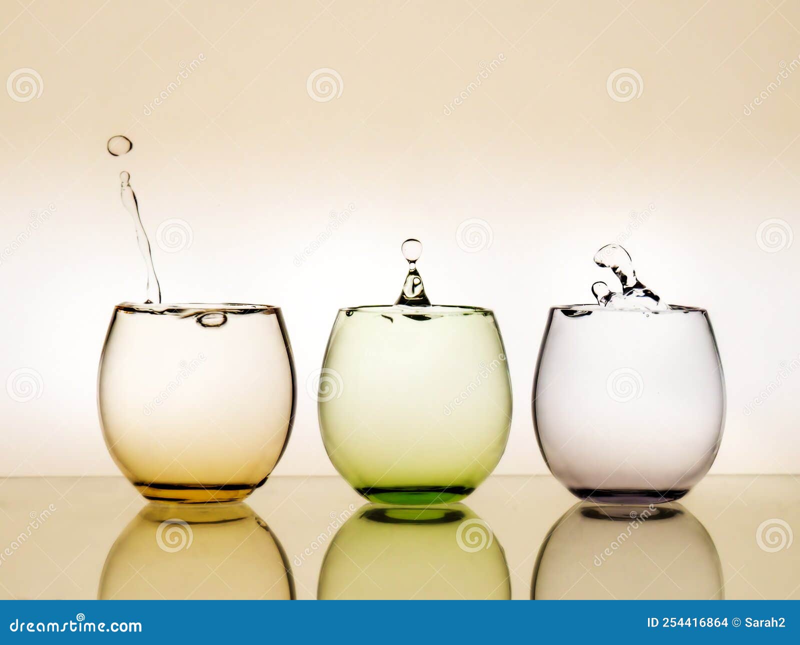 Water Falls. Drips in Three Colourful Glasses. Stock Photo - Image of ...