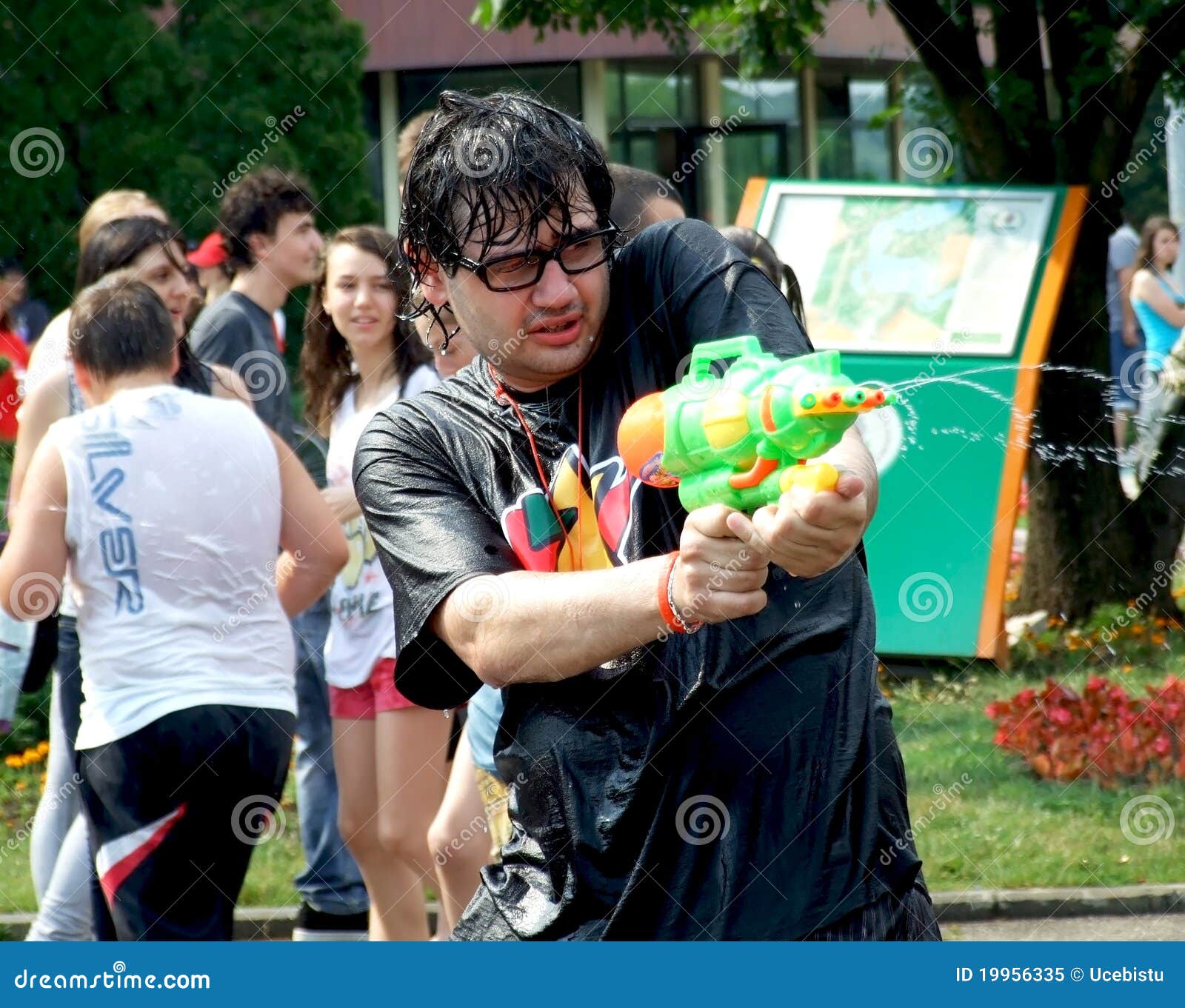 Water fight editorial image. Image of drops, people, herastrau - 19956335
