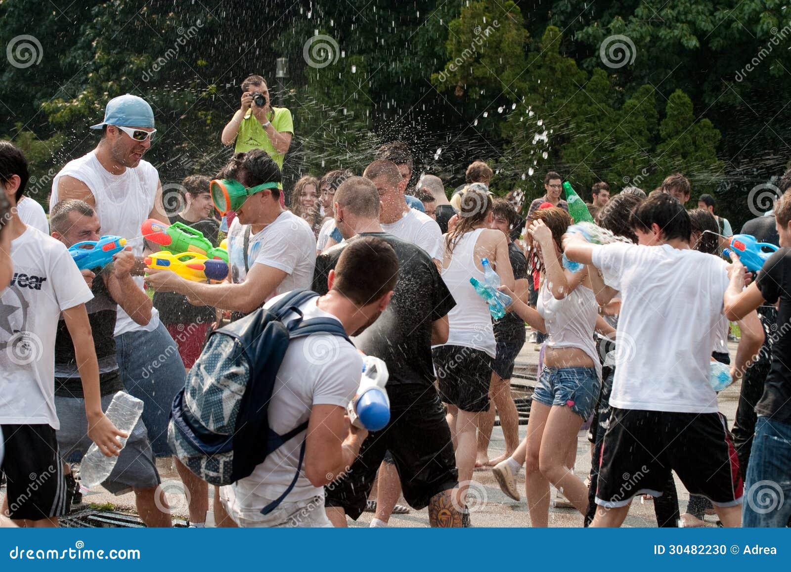 Wet Happy Teenagers at a Water Fight in Herastrau Park Editorial Image ...