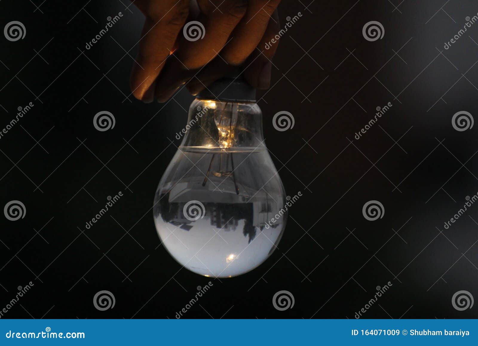 Water Fill into Filament Bulb and Glow Yellow Light Stock Image - Image ...