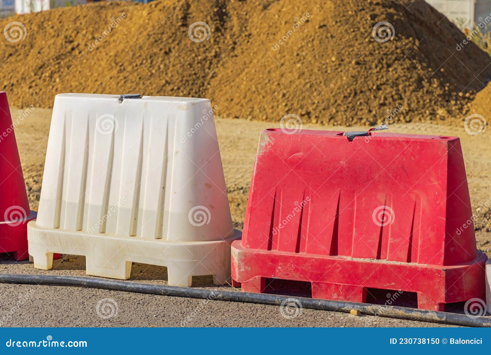 Water Filled Barriers stock photo. Image of street, sunny - 230738150