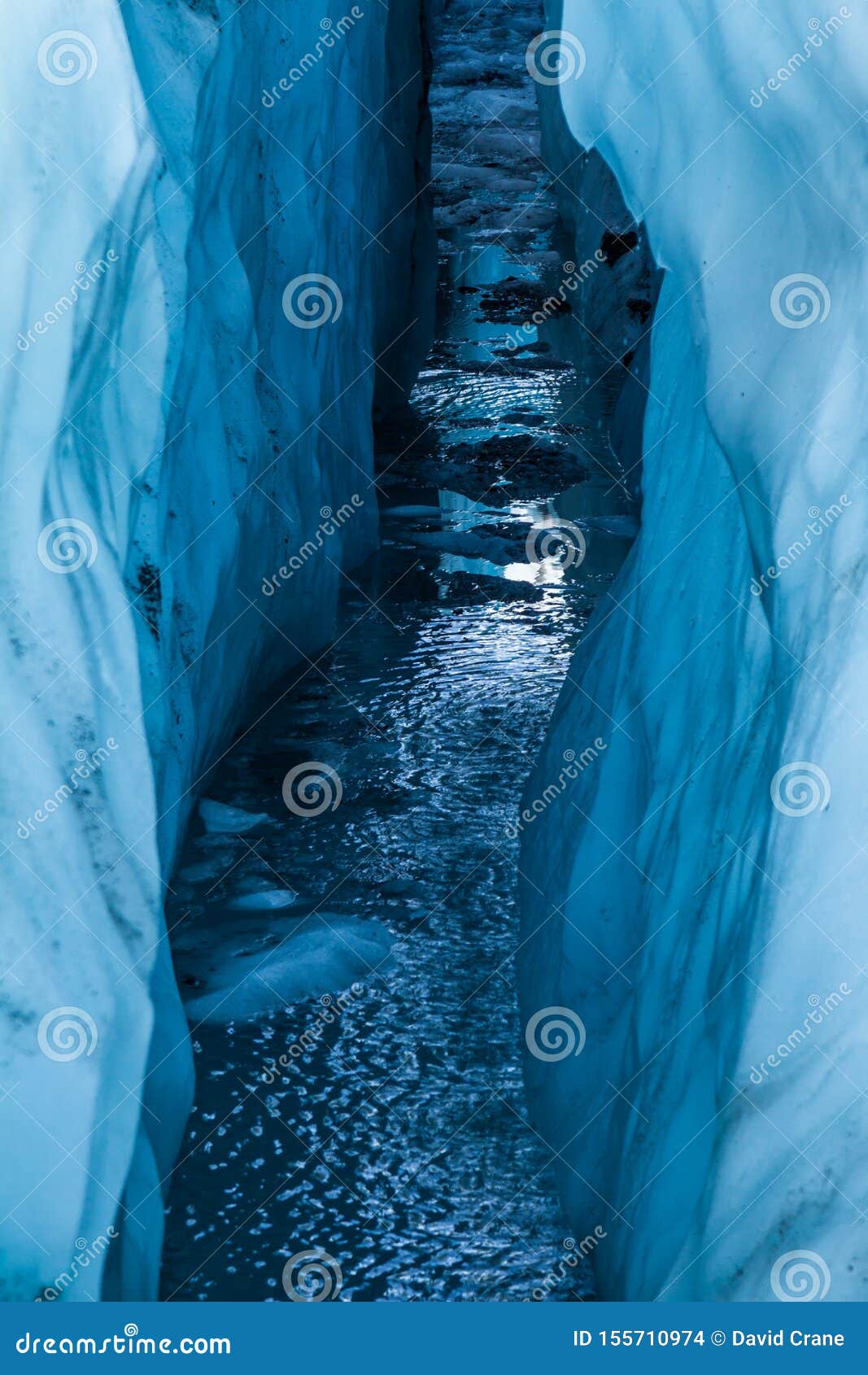 Water Filled Crevasse Reflecting the Sky from Deep within the Matanuska ...