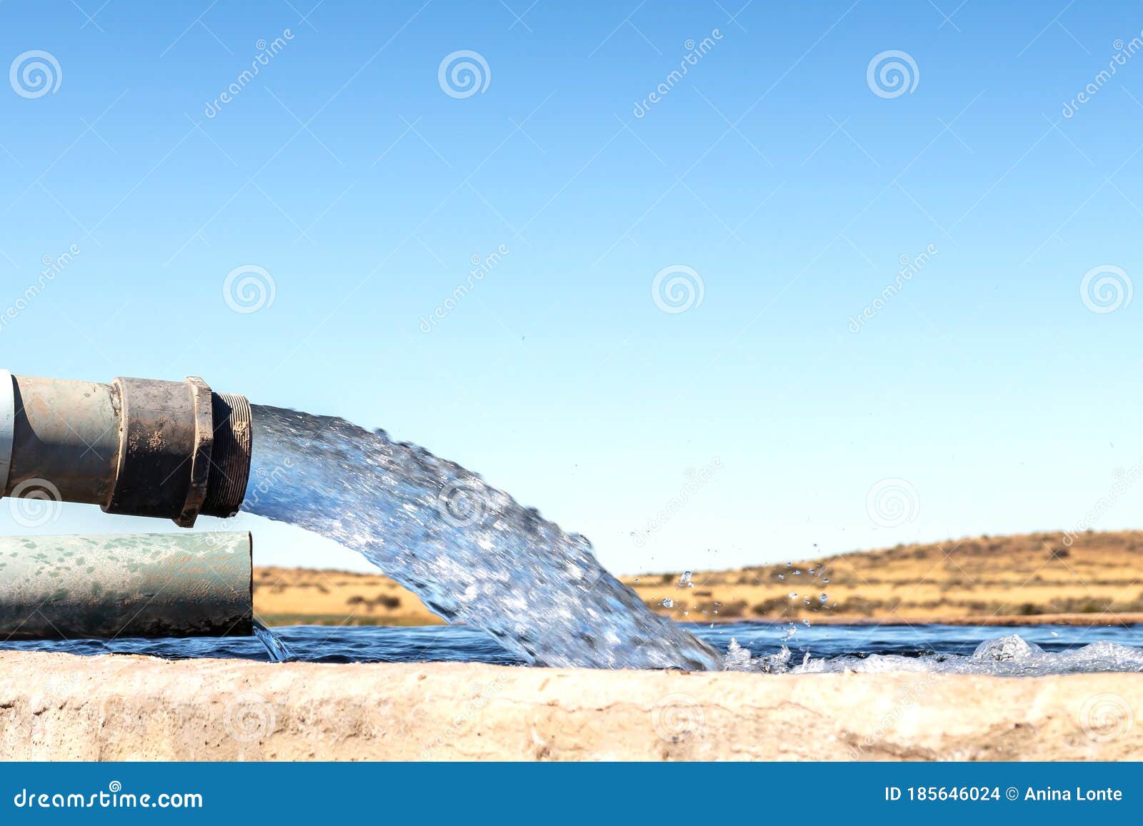 Water Filling a Cement Dam Outdoors on a Farm Stock Photo - Image of ...