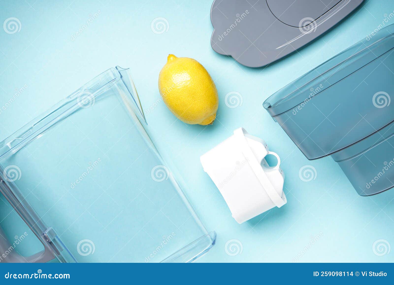Water Filter Jug with Lemon on a Blue Background, Top View Stock Photo ...