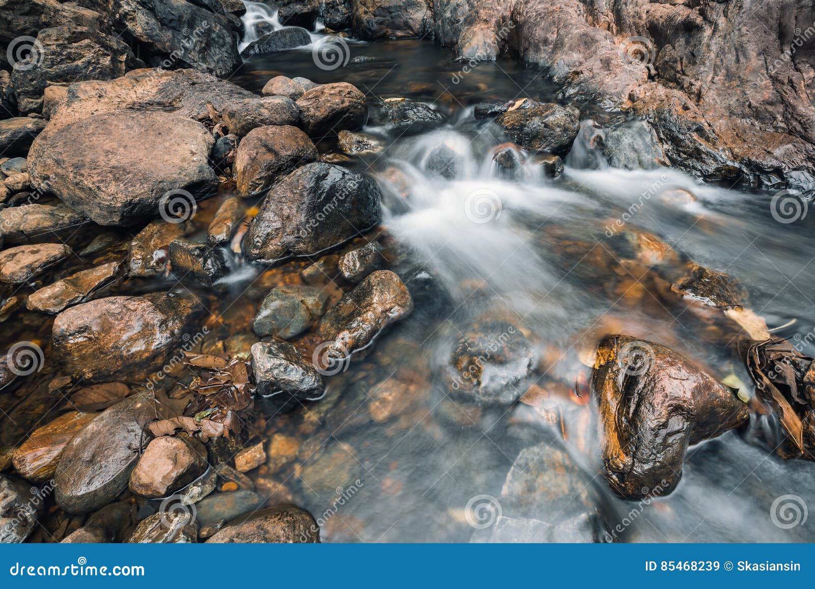Water Flow On Brown Rocks Royalty-Free Stock Photo | CartoonDealer.com ...
