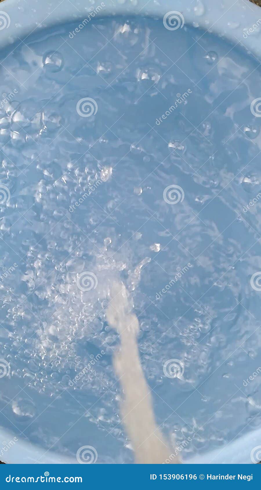 Water flow in the bucket stock footage. Video of waterfall - 153906196