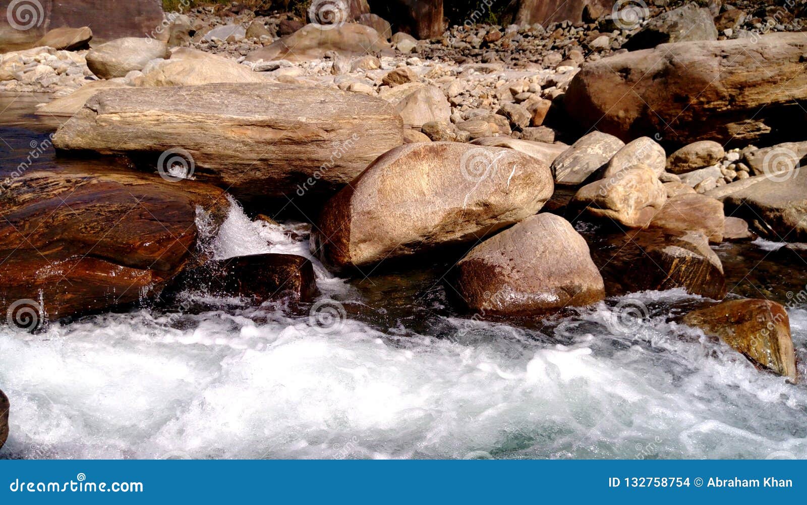 Water flow in the river stock photo. Image of waterfall - 132758754