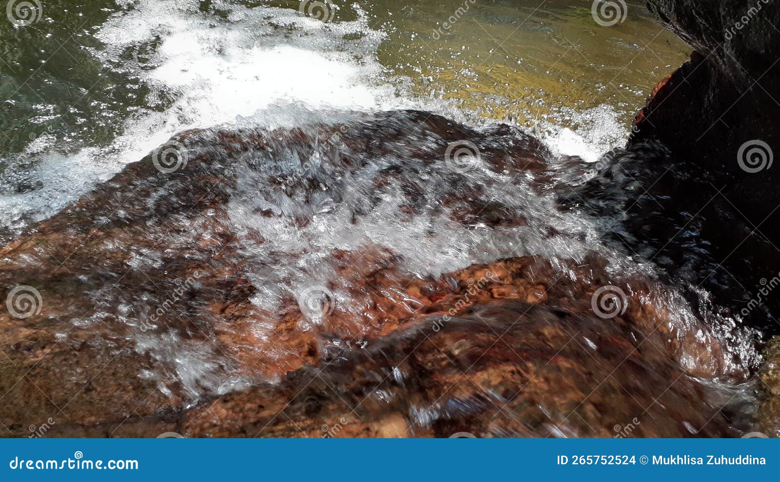 Water flow on rock stock photo. Image of water, flow - 265752524